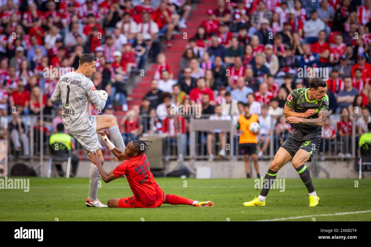 Munich, Germany.12th Mai 2024. Koen Casteels (Wolfsburg) Mathys Tel ...
