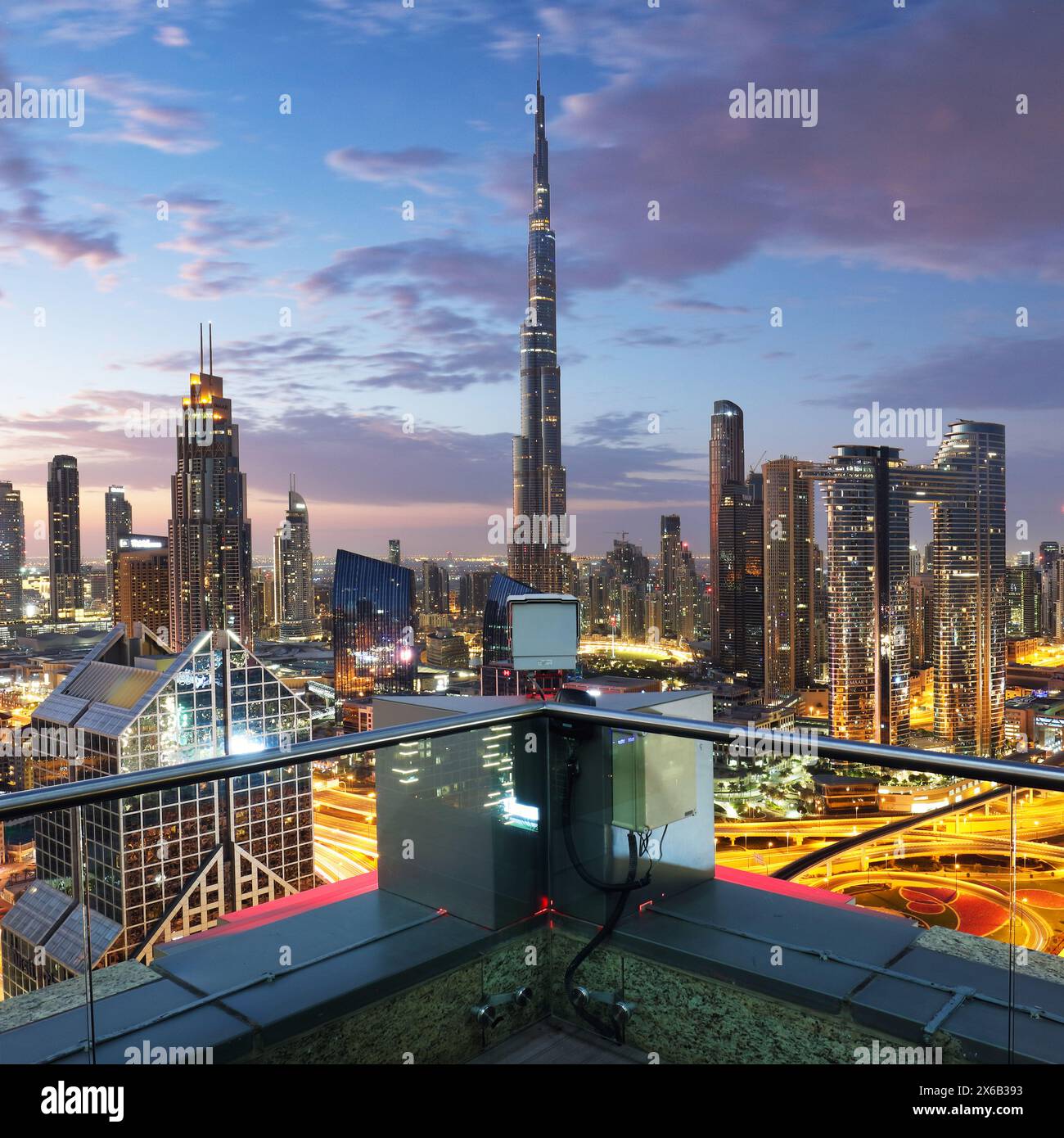 Fantastic rooftop view of Dubai's modern architecture by night with ...