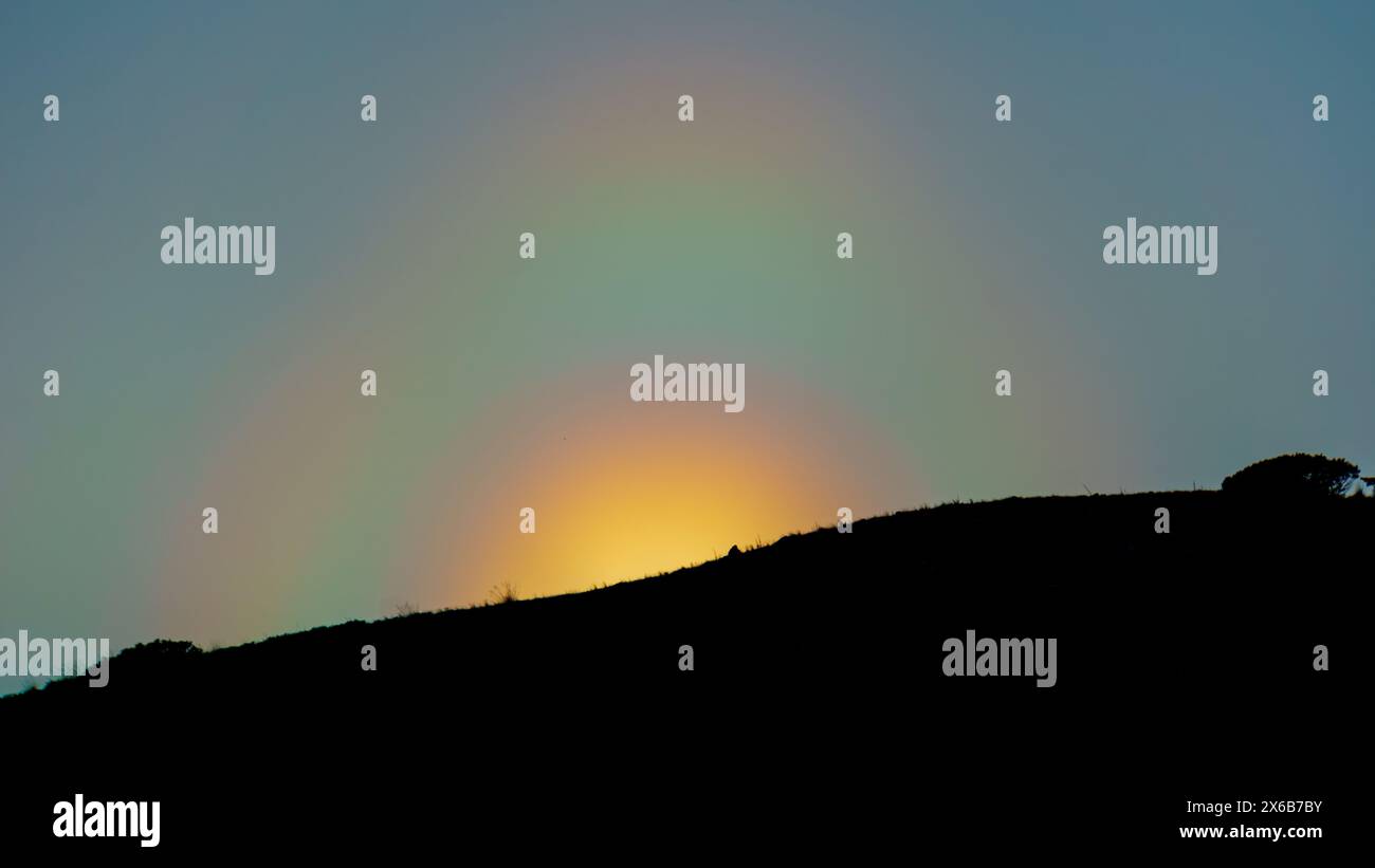 Natural phenomena of a circular rainbow called halo around the sun ...