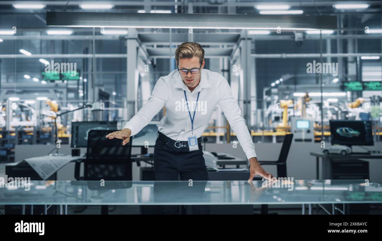Assembly employee and engineer hi-res stock photography and images - Alamy