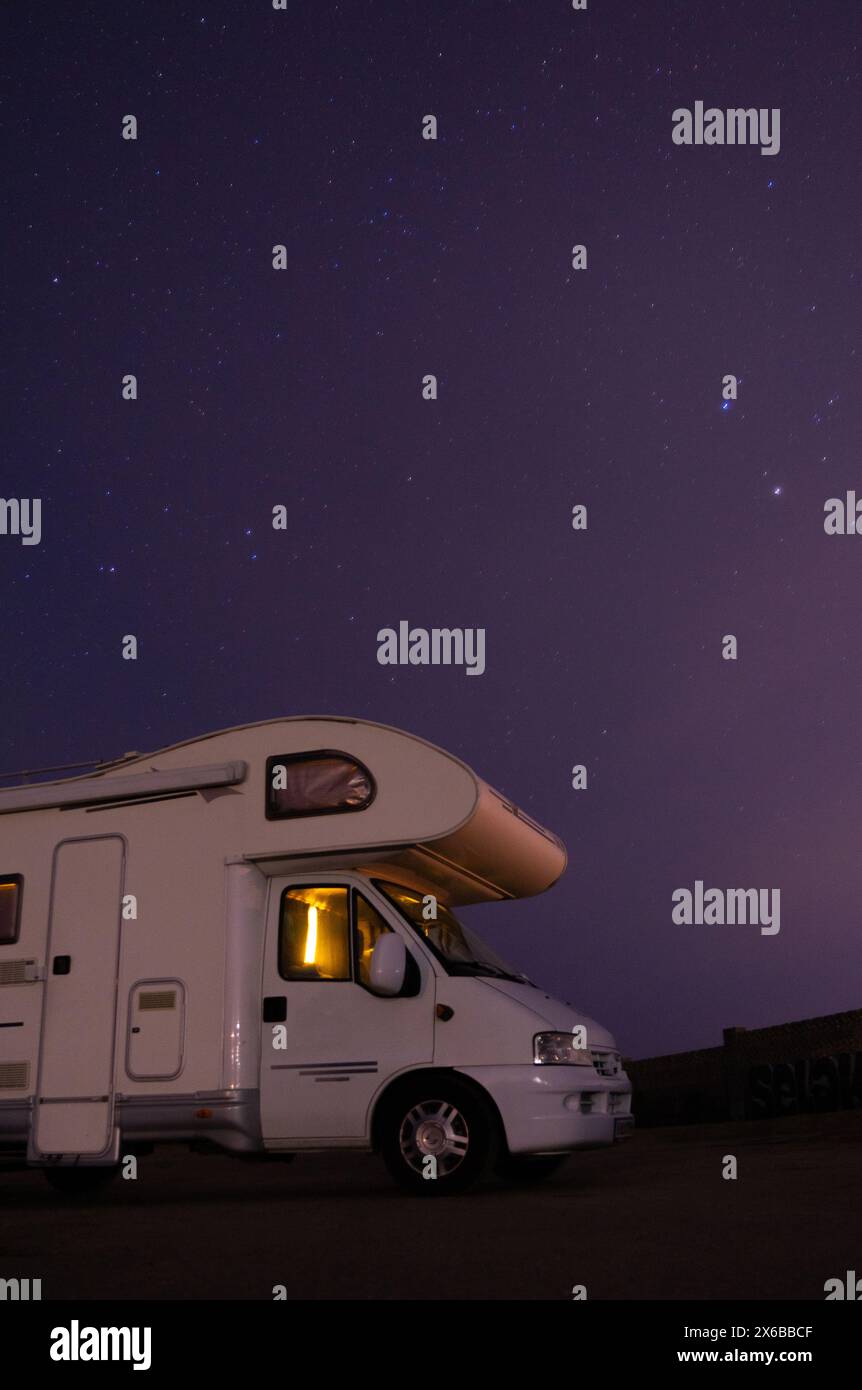 Motorhome on a starry night Stock Photo - Alamy