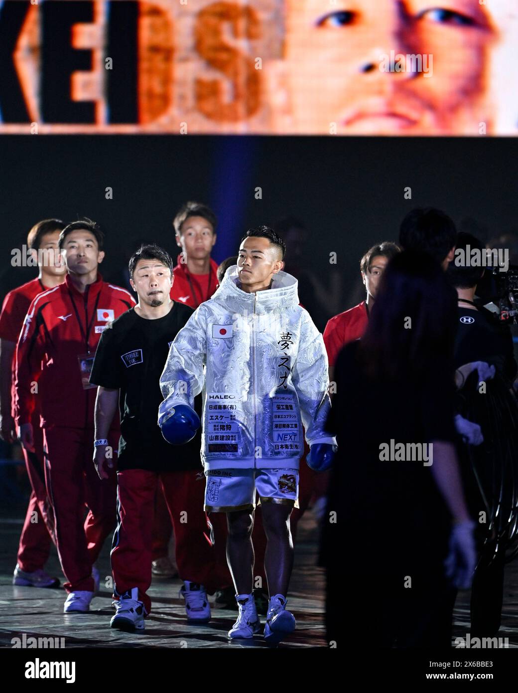 Challenger Yoshiki Takei of Japan and his trainer Akira Yaegashi befoe ...