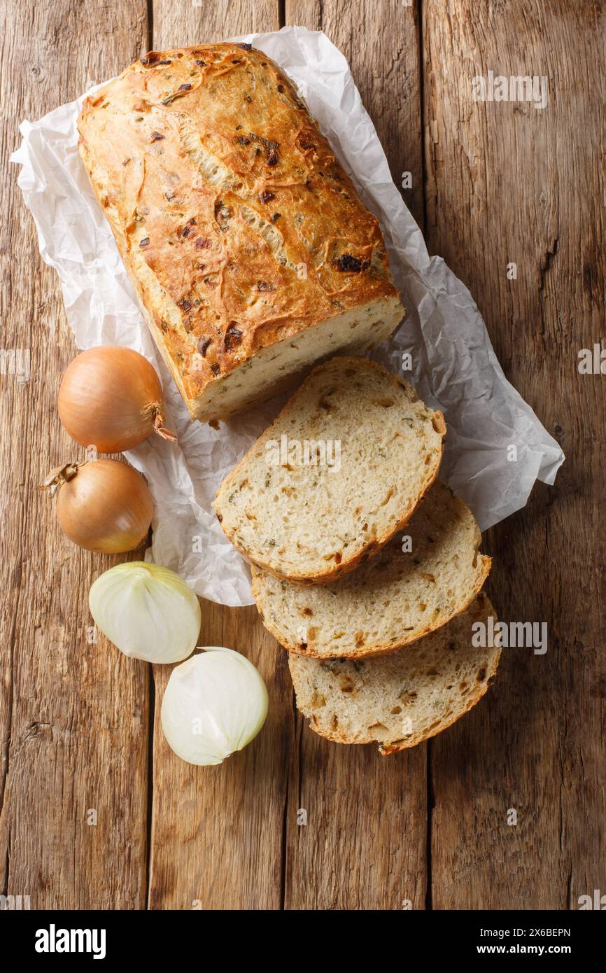 Homemade fragrant Caramelized Onion Bread closeup on the wooden board ...