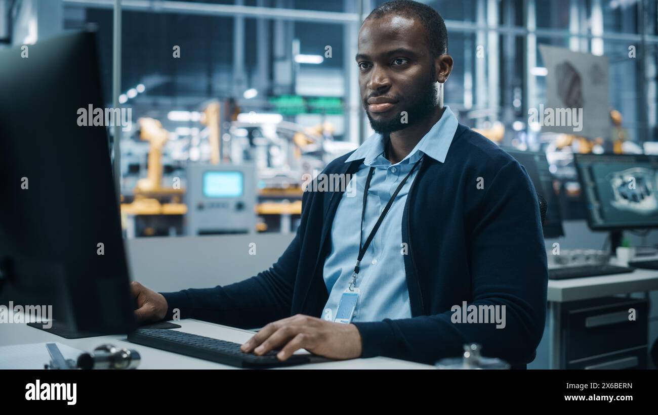 Car Factory Office: Portrait of Confident Black Male Chief Engineer ...