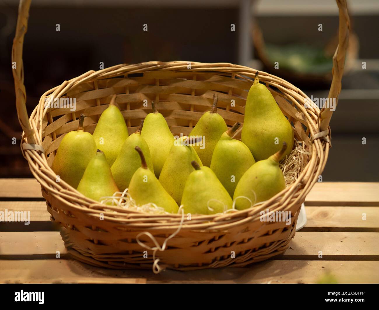 Basket of pears on display for sale at the market Stock Photo - Alamy