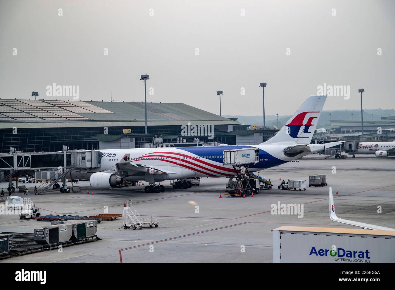 Planes park at Terminal 1 Building, International Airport. Kuala Lumpur ...