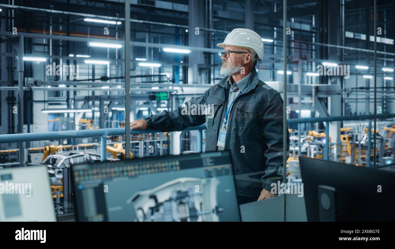 Car Factory: Confident Male Automotive Engineer Wearing Hard Hat ...