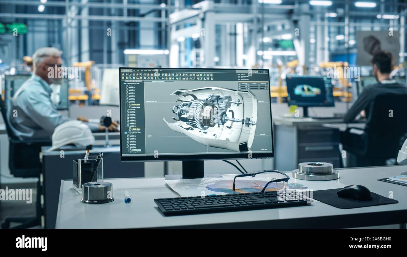 Car Factory Office: On the Desk Computer with Turbine Prototype, Design ...