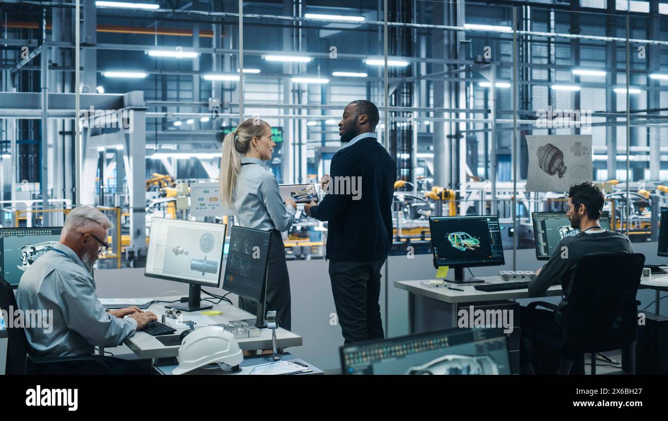 Car Factory Office: Team of Automotive Engineers Working, Talk, Use Tablet Computers to Design ...
