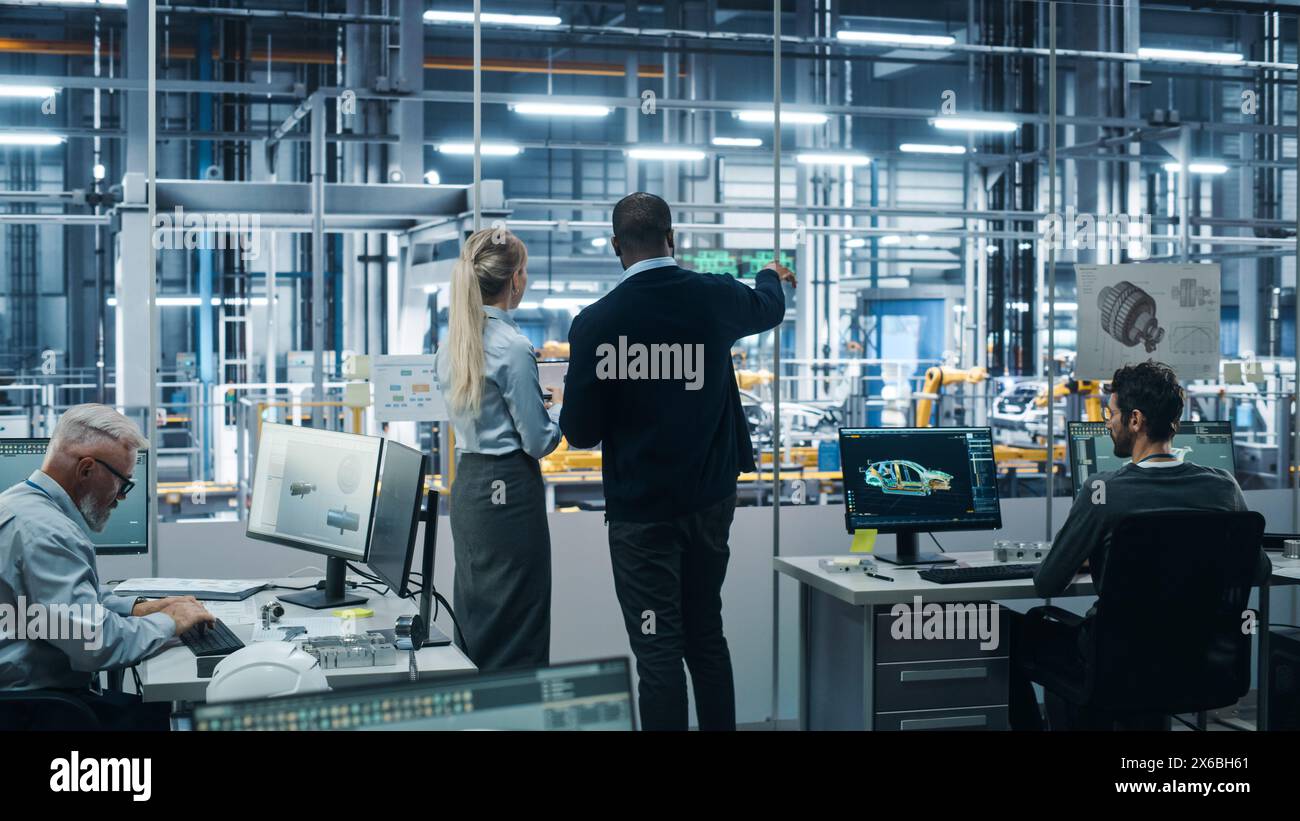 Car Factory Office: Team of Automotive Engineers Working, Talk, Use Tablet Computers to Design ...