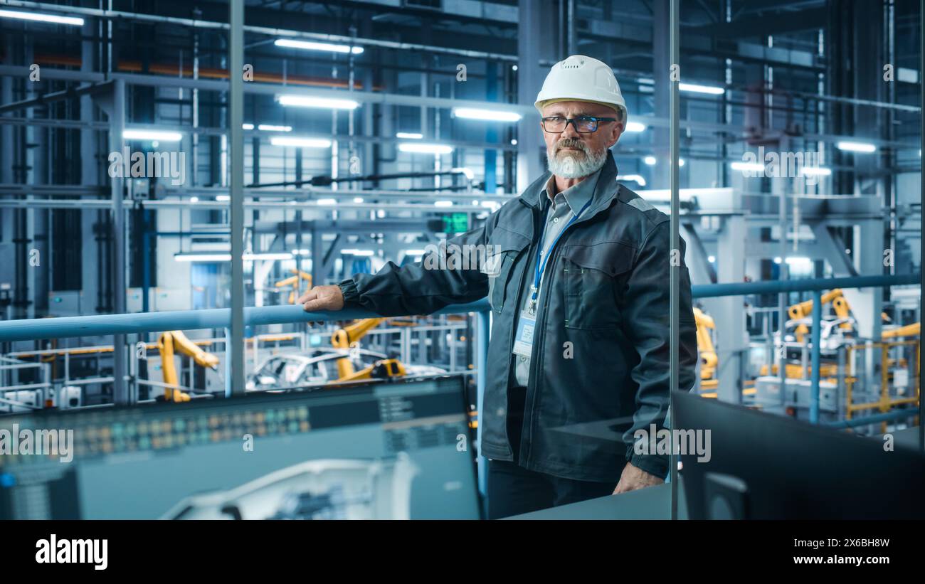 Car Factory: Confident Male Automotive Engineer Wearing Hard Hat ...