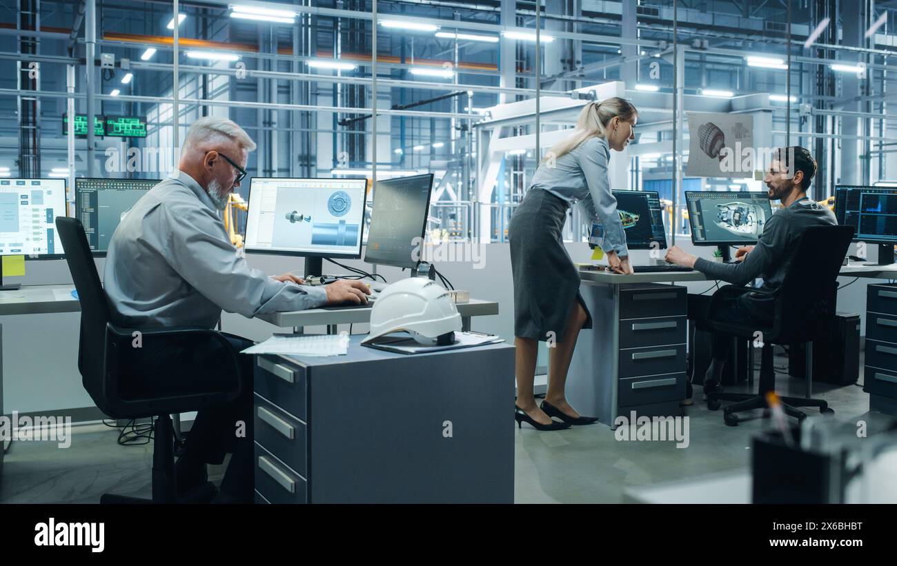 Car Factory Office: Project Manager Talks to Engineer Working on ...
