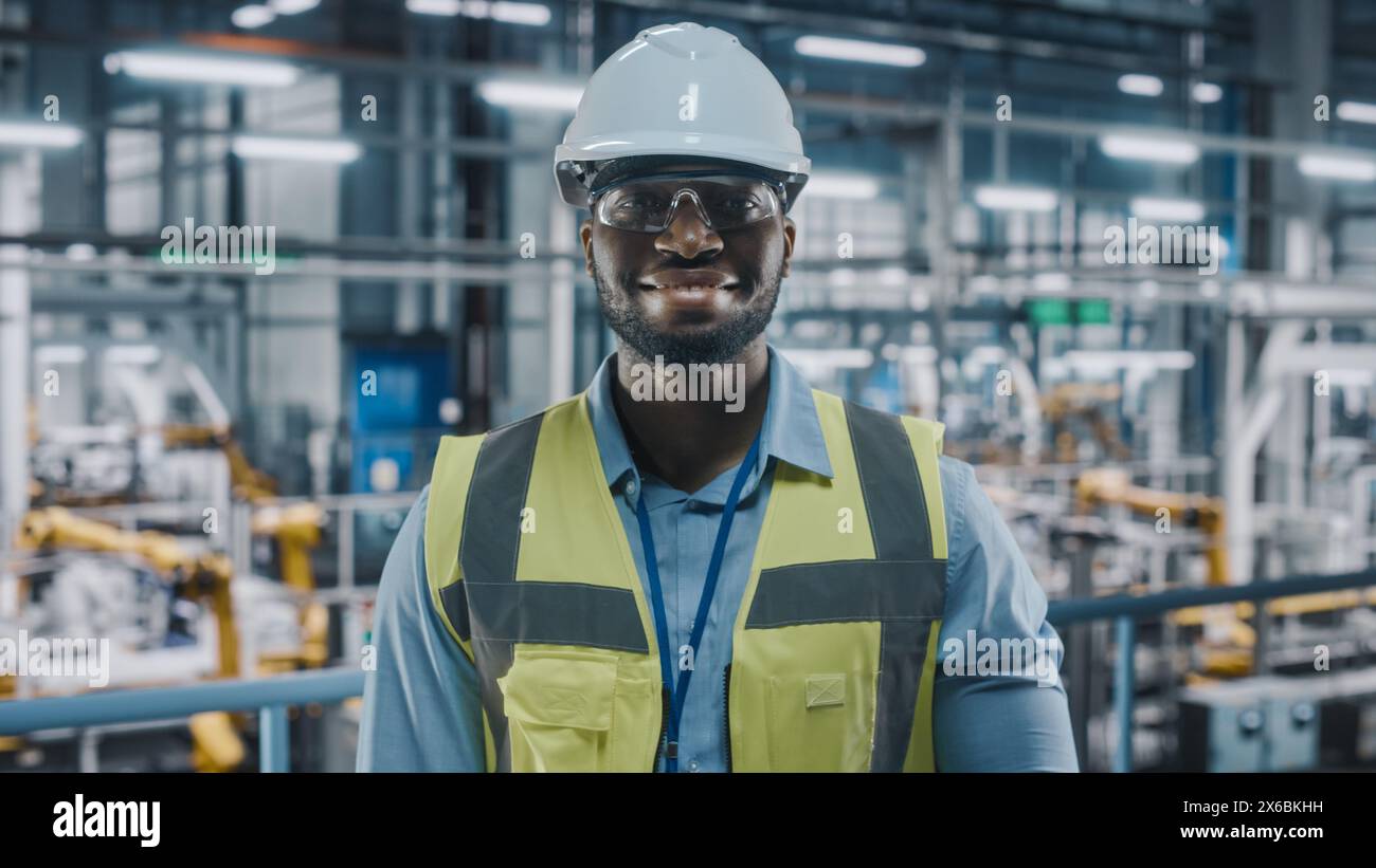 Smiling smart factory specialist hi-res stock photography and images ...
