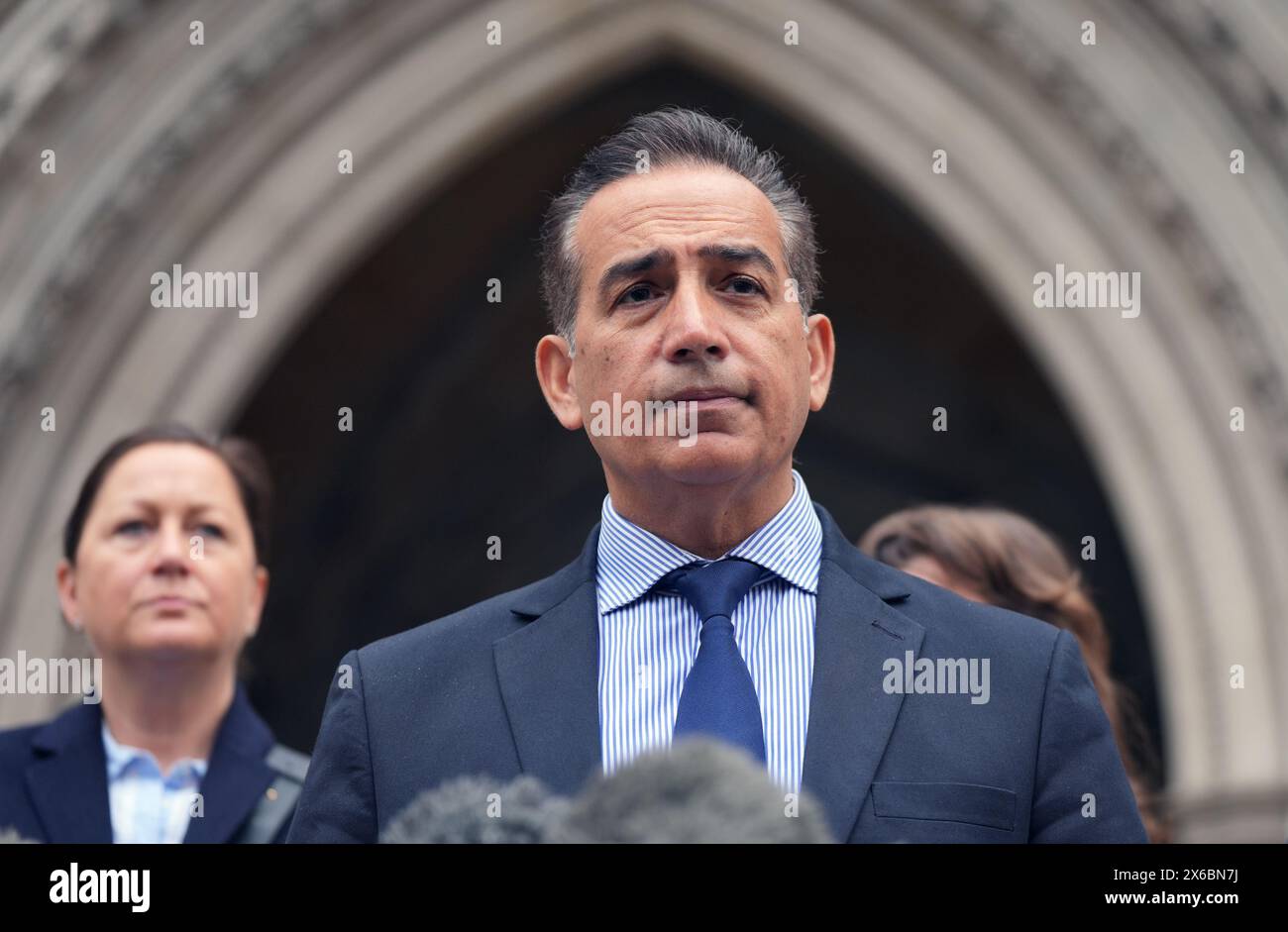 Dr Sanjoy Kumar, father of Grace O'Malley-Kumar, speaks to the media ...