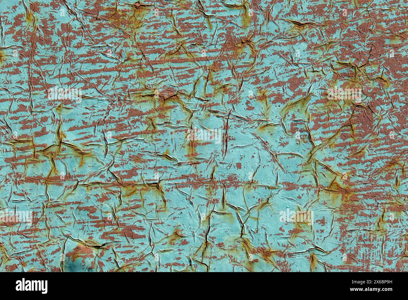 Old dried paint with cracks on a rusty metal surface. Textured rough ...