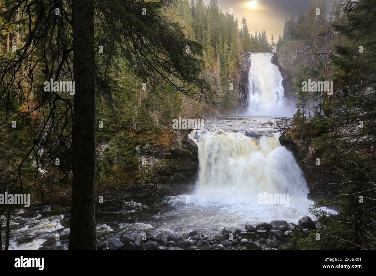 Spring flood at the waterfall Storfoss located at the river Homla ...