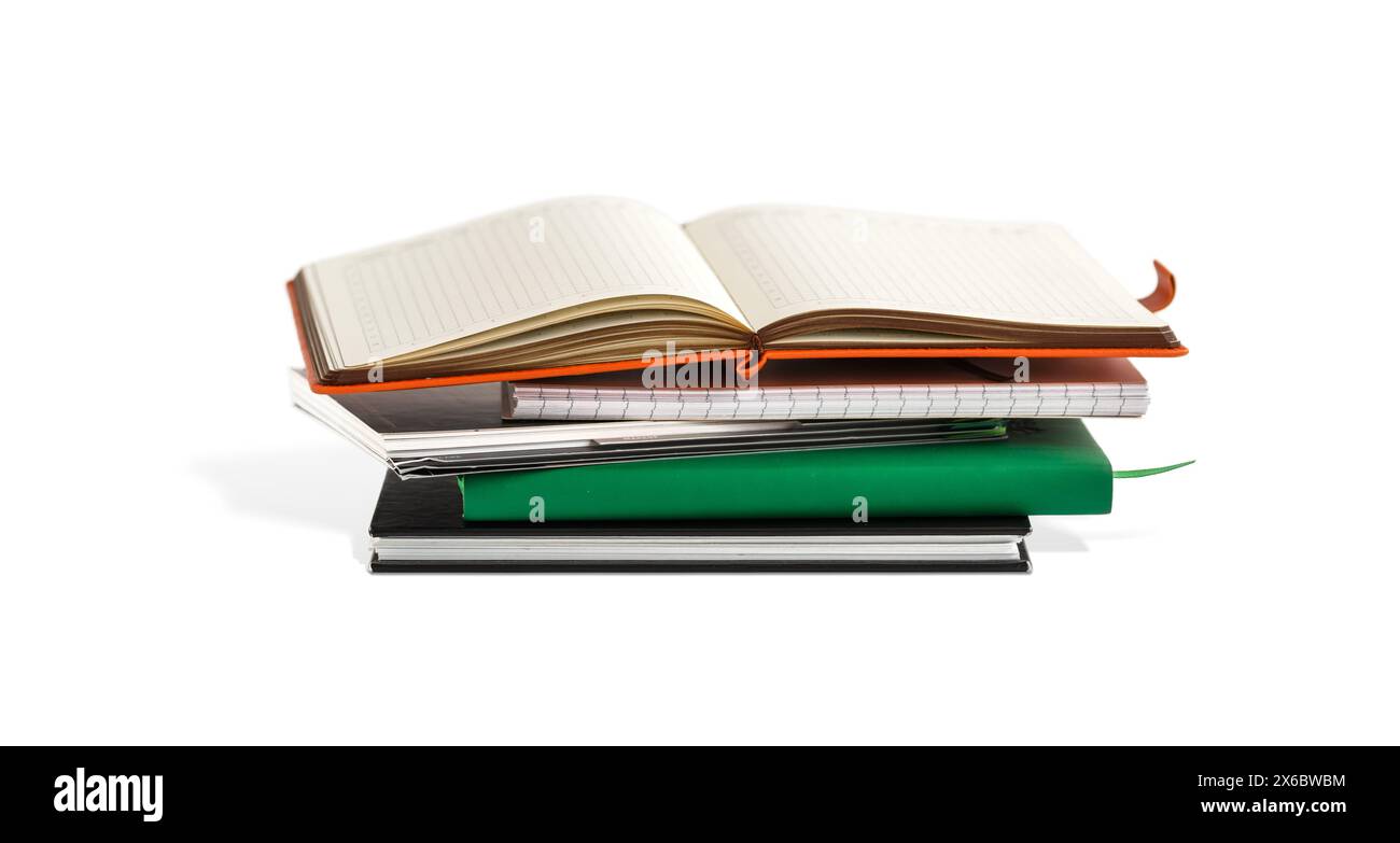 Open blank notepad. Stack of books isolated on white background Stock ...