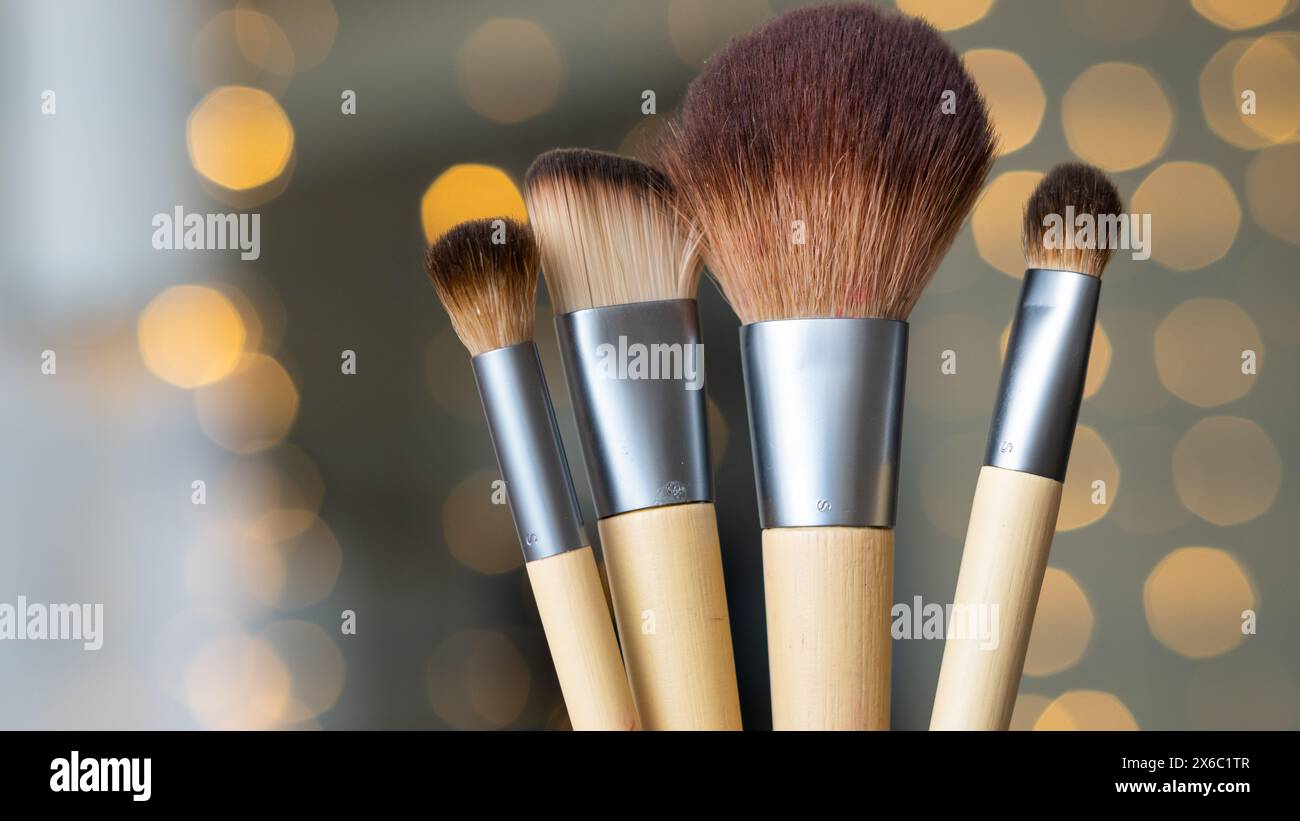 Wooden organic makeup brushes on white backdrop. Eco-friendly ...