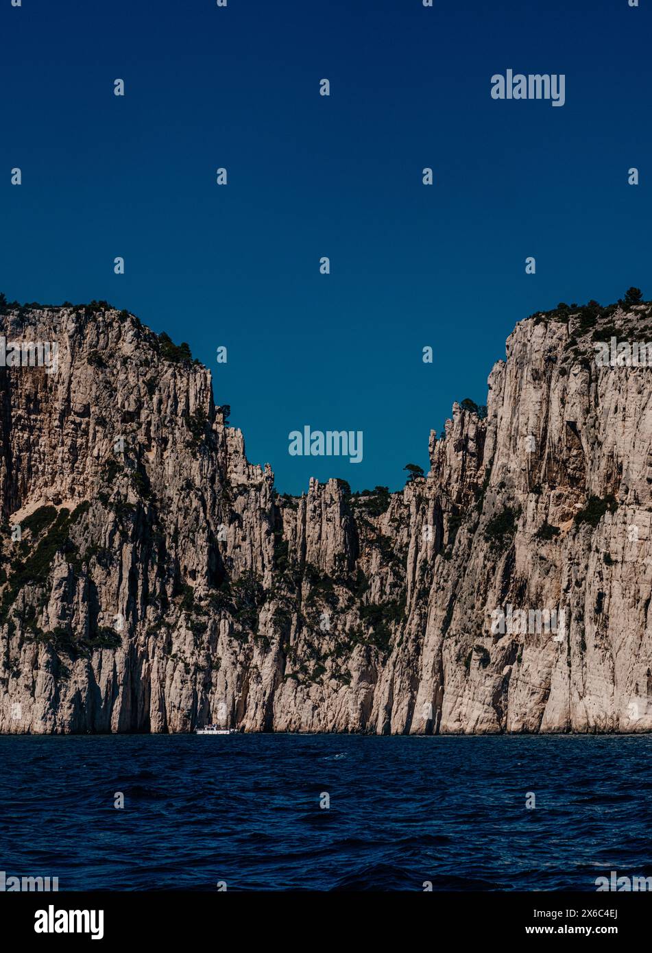 Majestic limestone cliffs rising from the Mediterranean Sea Stock Photo ...