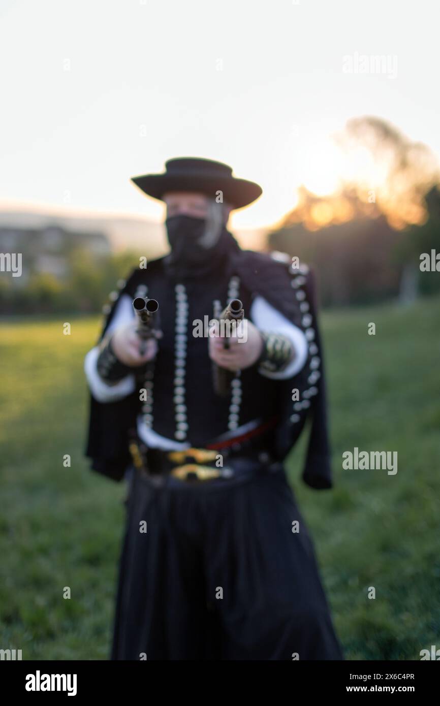 Man pointing gun hi-res stock photography and images - Alamy