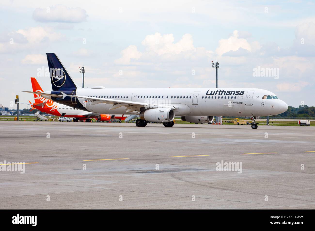 Passenger plane of the German airline Lufthansa D-AIDB. Airport apron ...