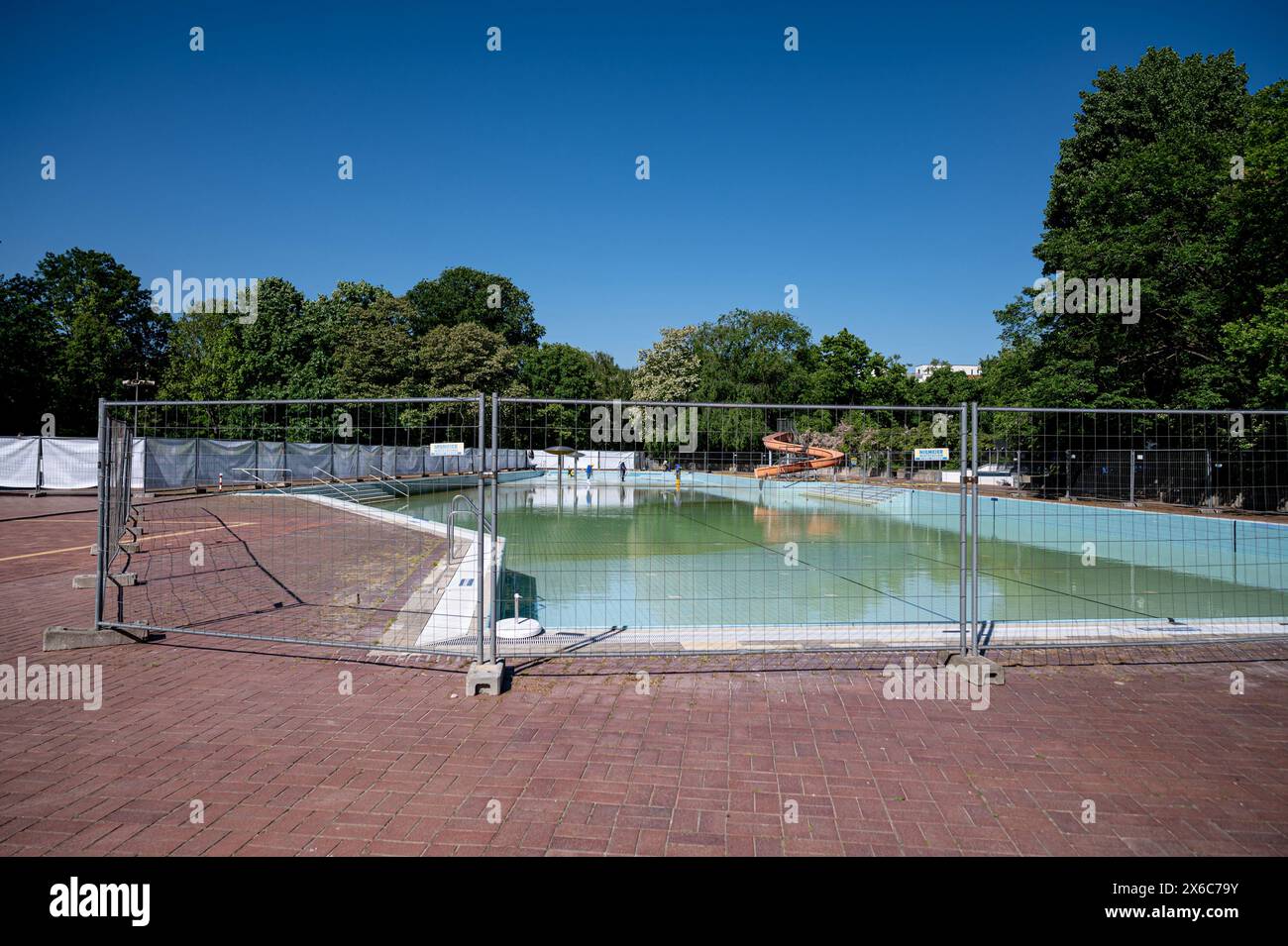 Berlin, Germany. 14th May, 2024. A construction fence stands in front ...