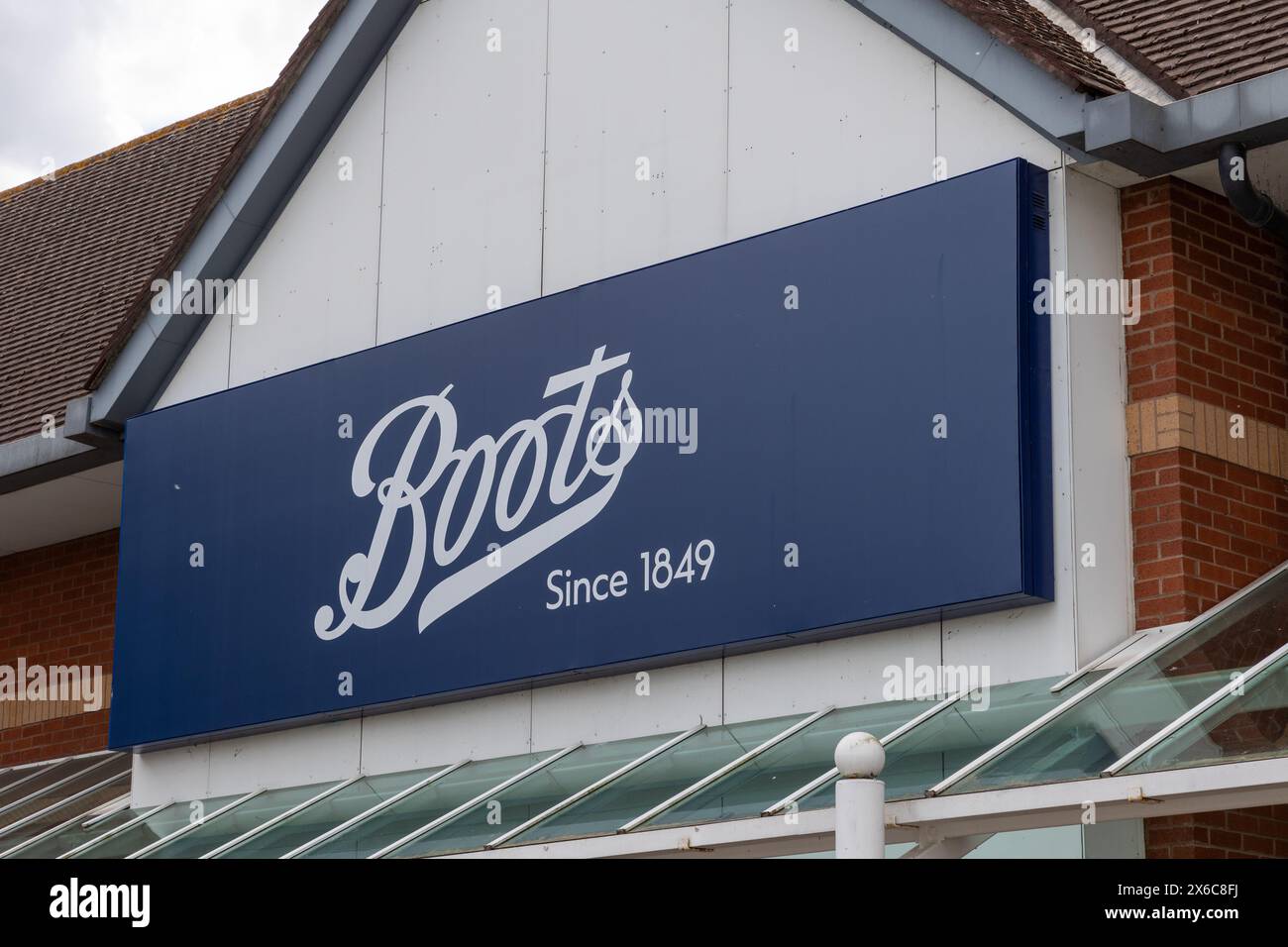 Boots storefront signage Stock Photo - Alamy