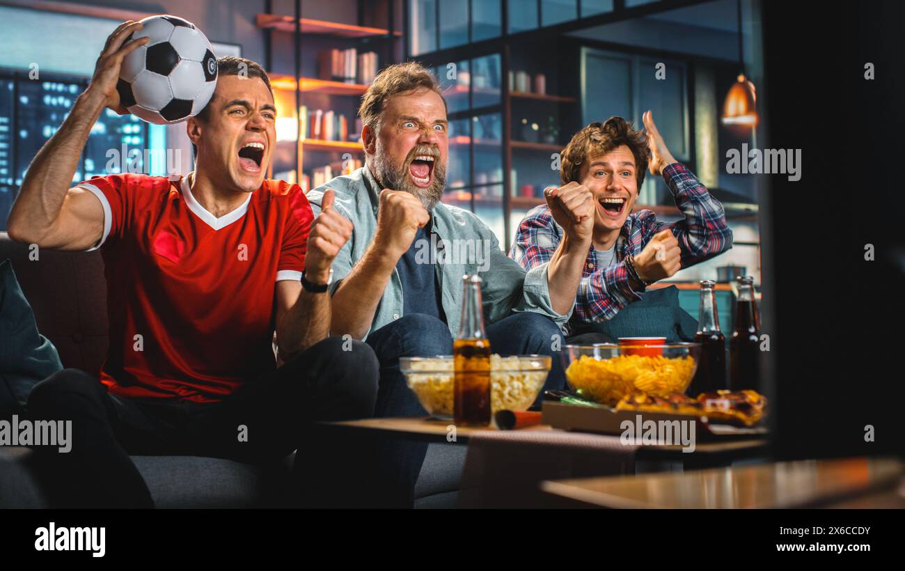 Night At Home: Three Joyful Soccer Fans on a Couch Watch Game on TV ...