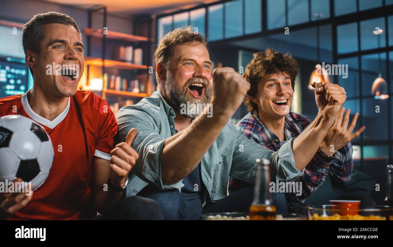 Night At Home: Three Joyful Soccer Fans on a Couch Watch Game on TV ...