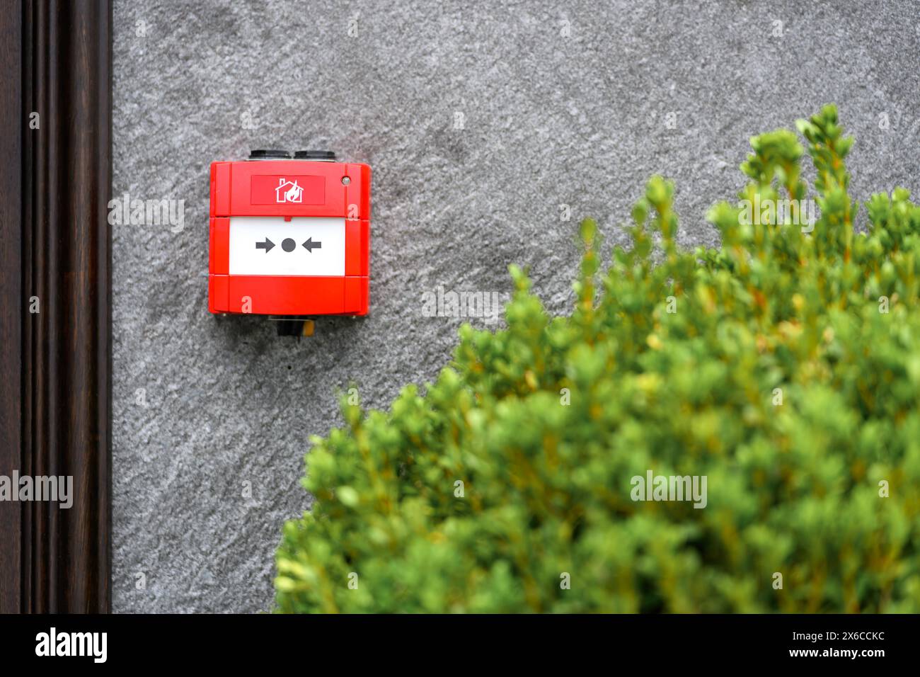 Full front view of outdoor wall mounted fire alarm button Stock Photo ...