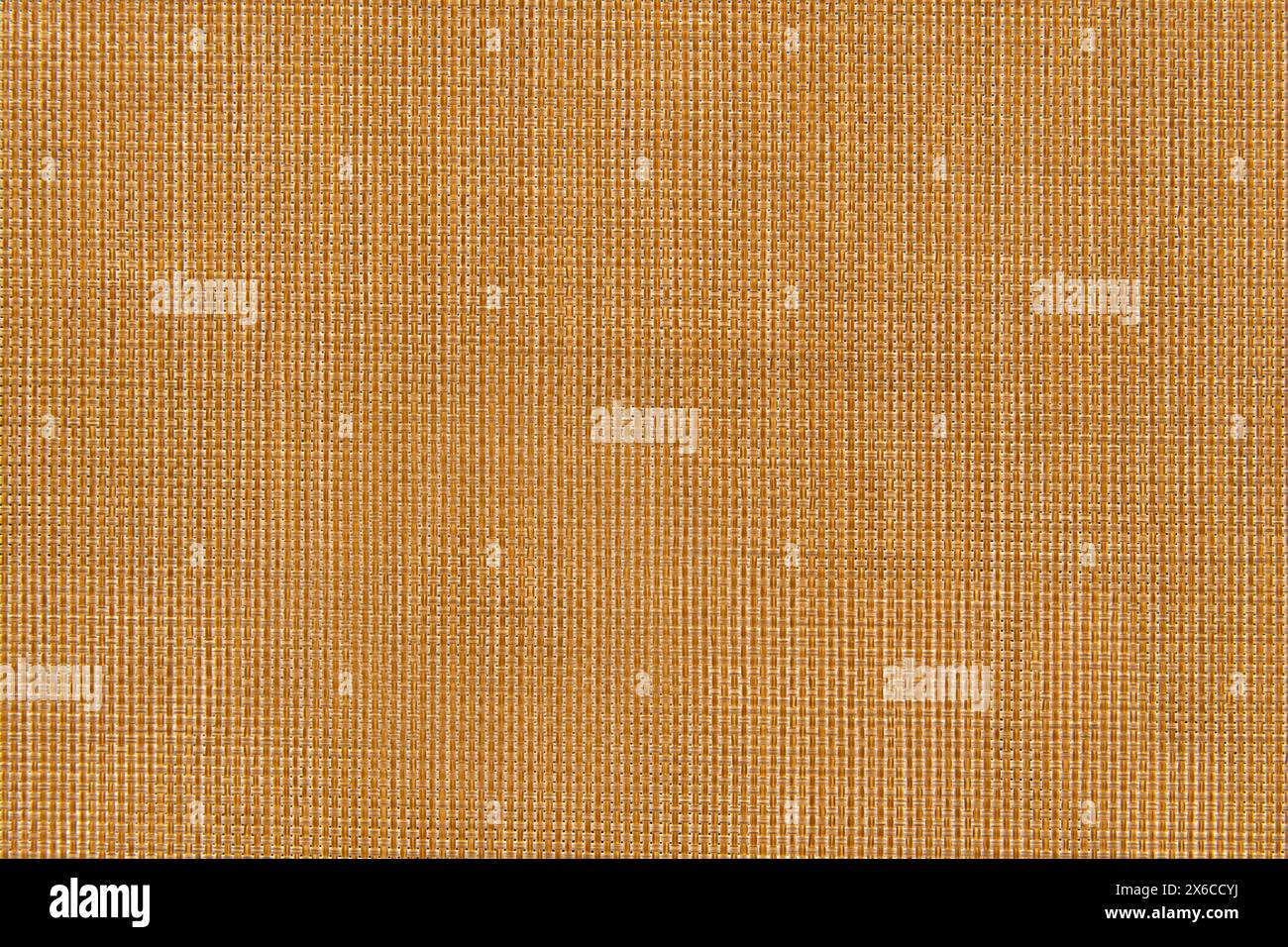 Woven fabric texture pattern with a rich, golden brown hue Stock Photo ...