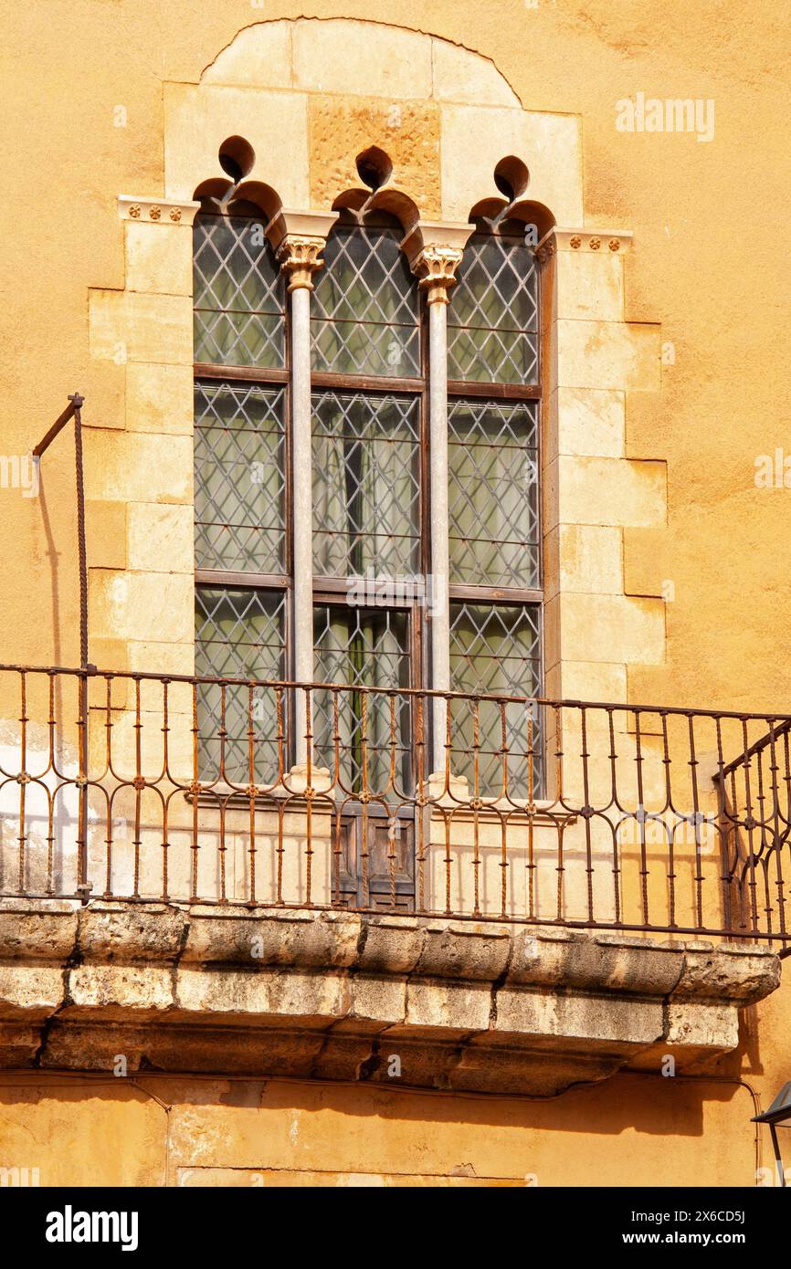 Window and balcony of a house with a blue wall Stock Photo - Alamy