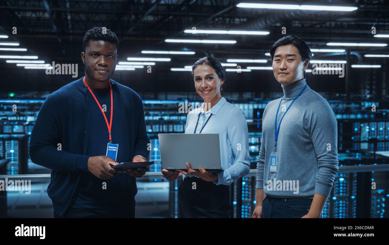 Portrait smiling data center specialists hi-res stock photography and ...