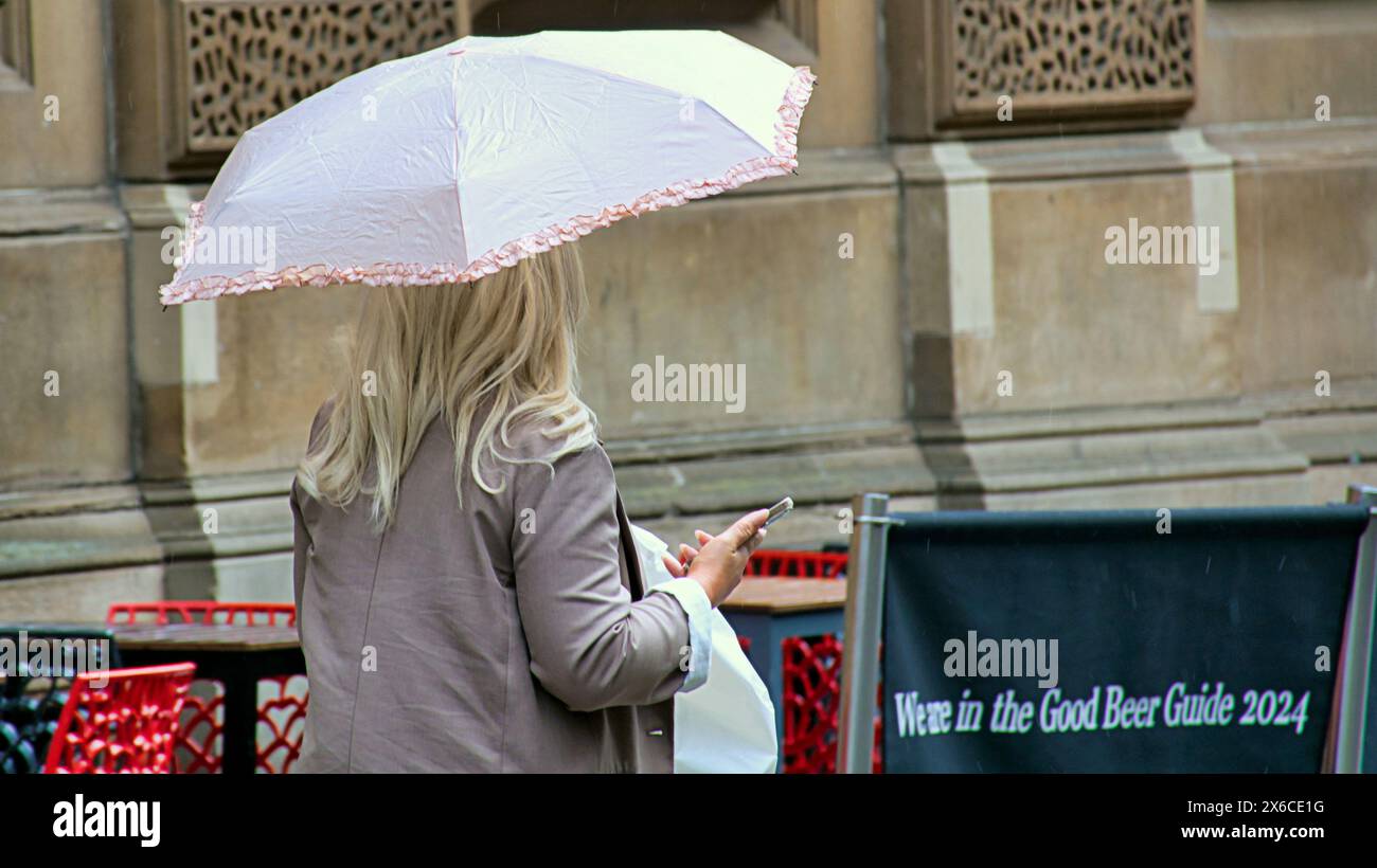 Glasgow, Scotland, UK. 14th May, 2024: UK Weather: Sunny and wet as it ...
