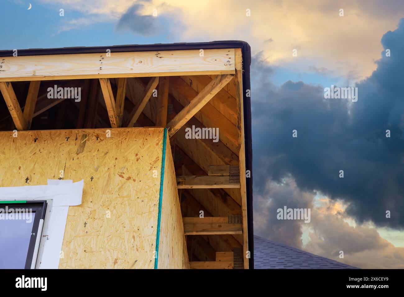 During construction of house, joist framework featuring plywood is ...