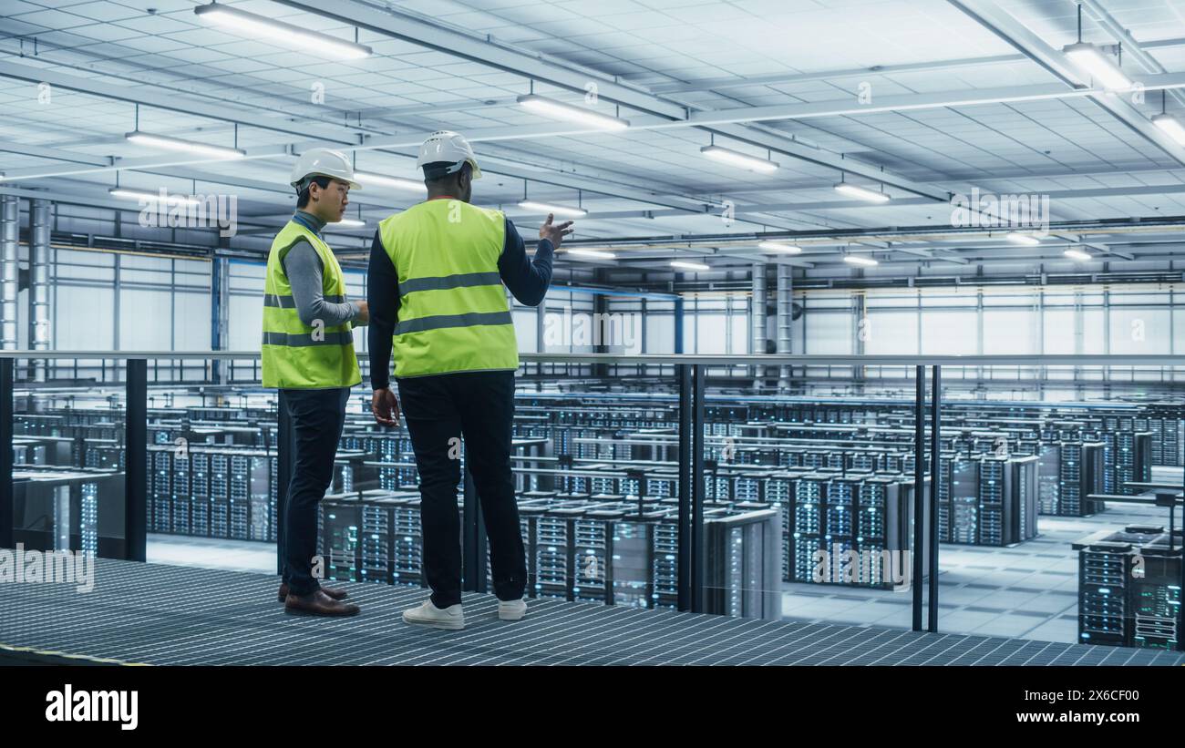 Professional engineers in safety vests hi-res stock photography and ...