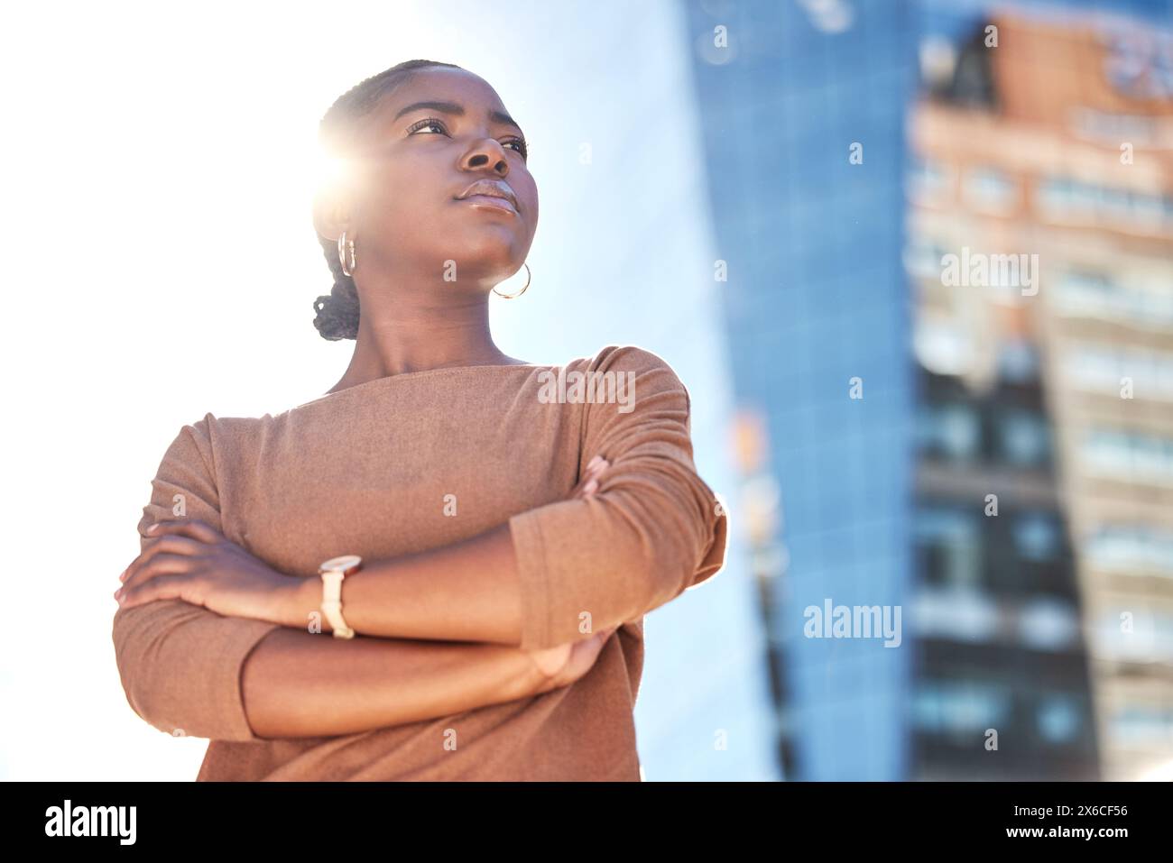 Crossed arms, thinking and business black woman for ambition mindset, travel and morning commute ...