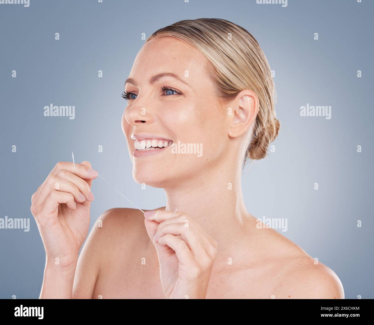 Dental, floss and woman with clean teeth in studio background and ...
