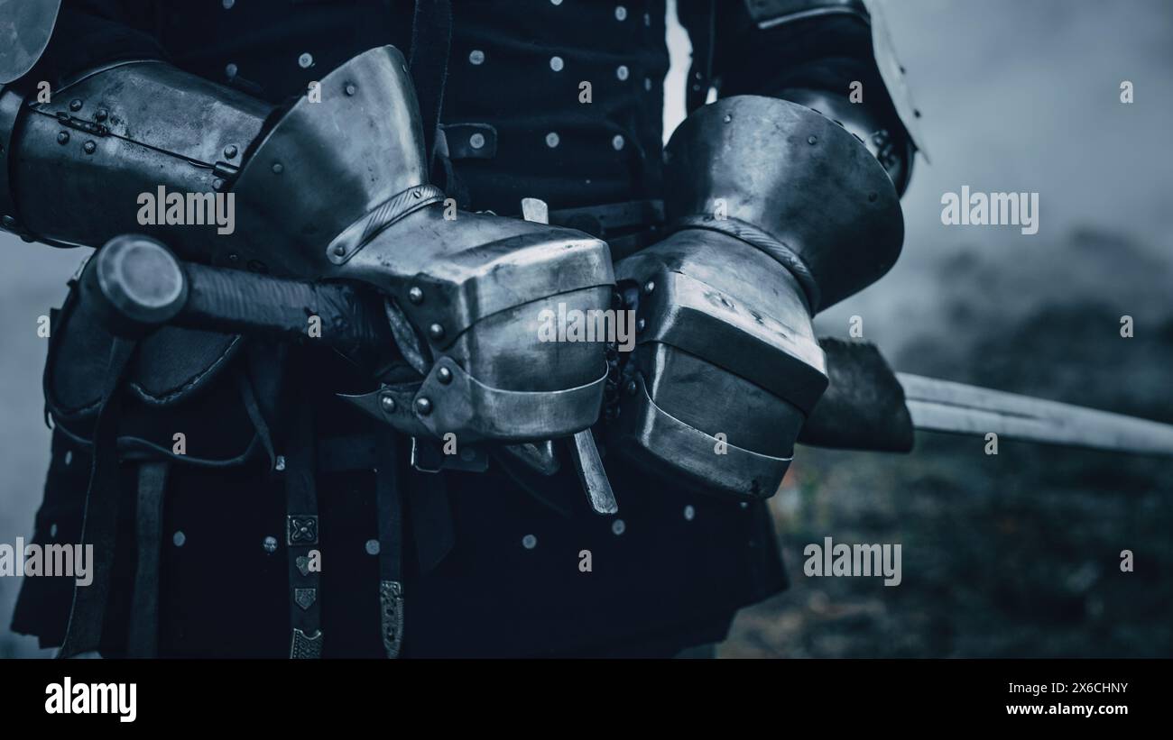 Medieval Knight Wearing Armour and Helmet, Draws Sword from Shearh ...