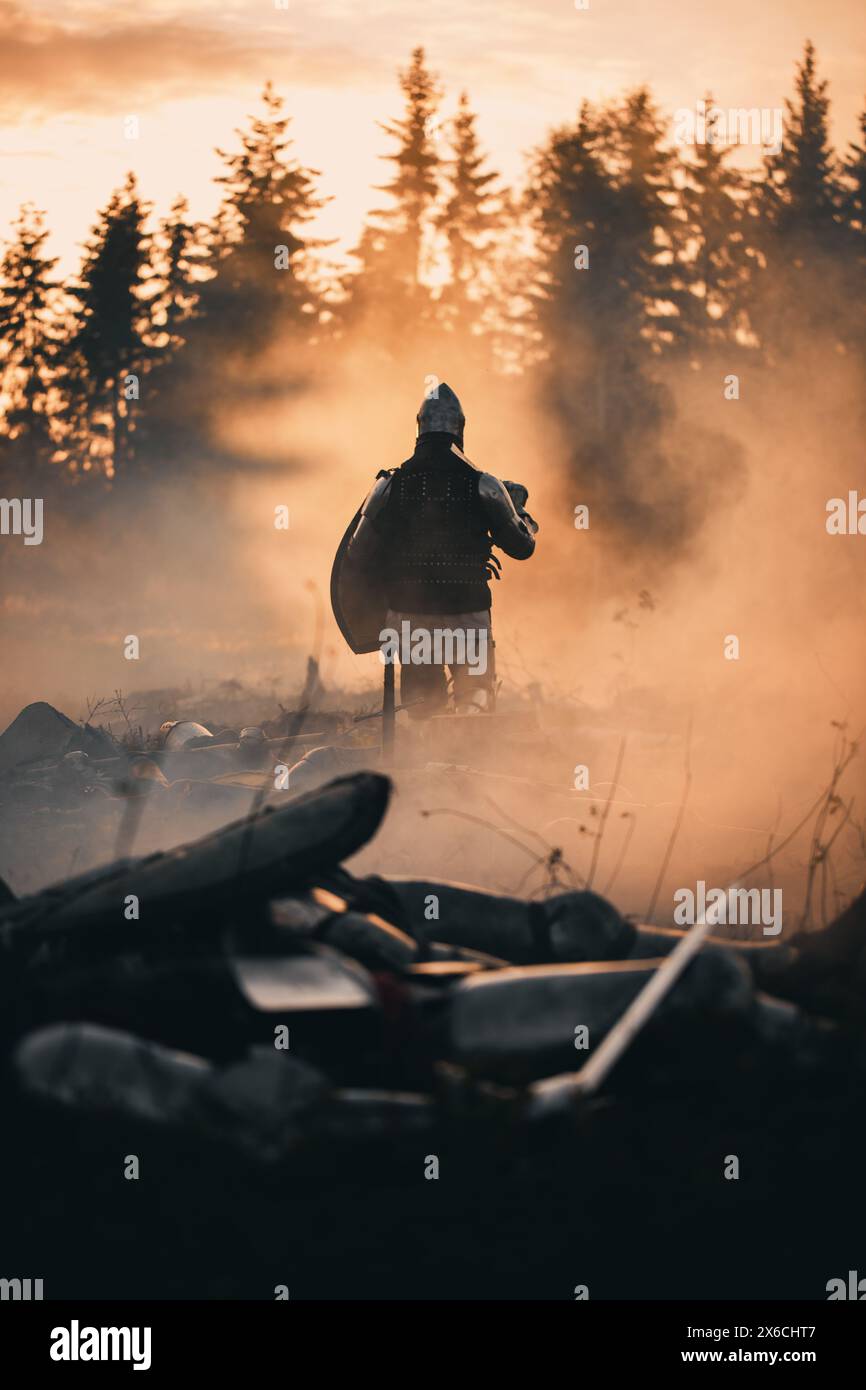 Medieval Knight Walking on Battlefield amidst Dead Enemies. Surviving ...