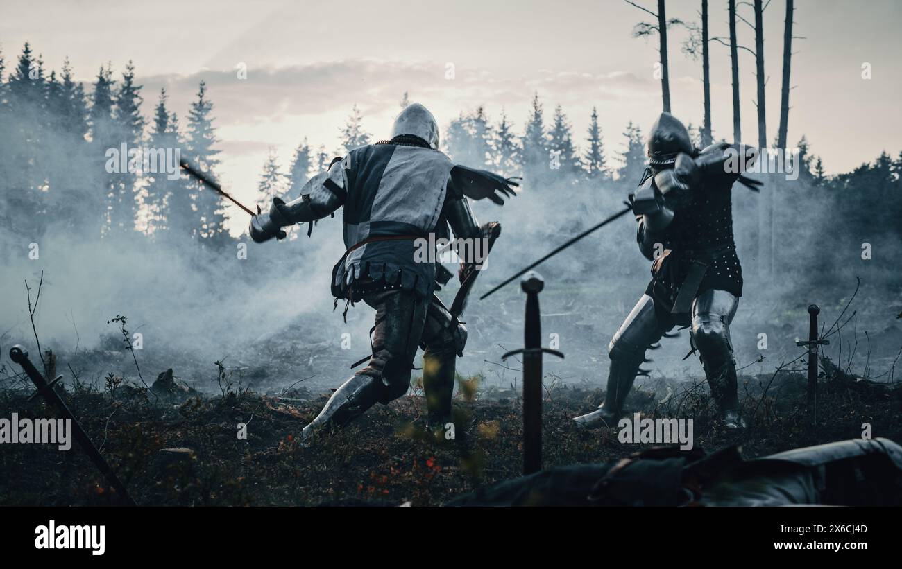 Epic Battlefield: Two Armored Medieval Knights Fighting with Swords ...