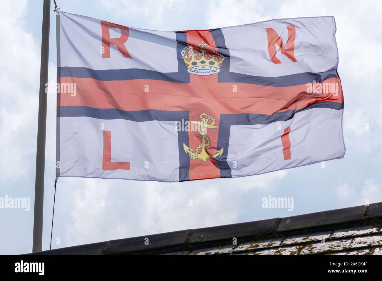 The Royal National Lifeboat Institution (RNLI) flag flying at the ...