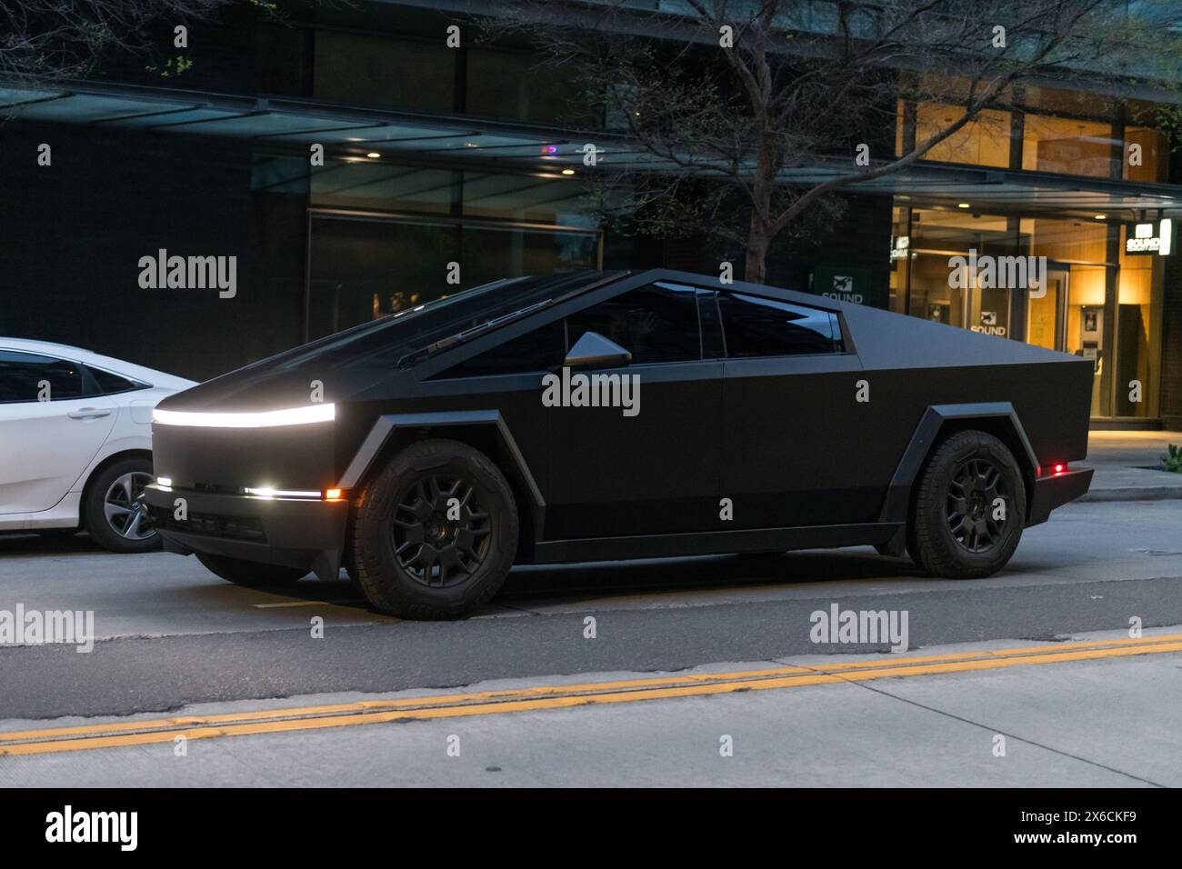 Seattle, USA. 15 Apr, 2024. A matte black wrapped Tesla Cybertruck on ...