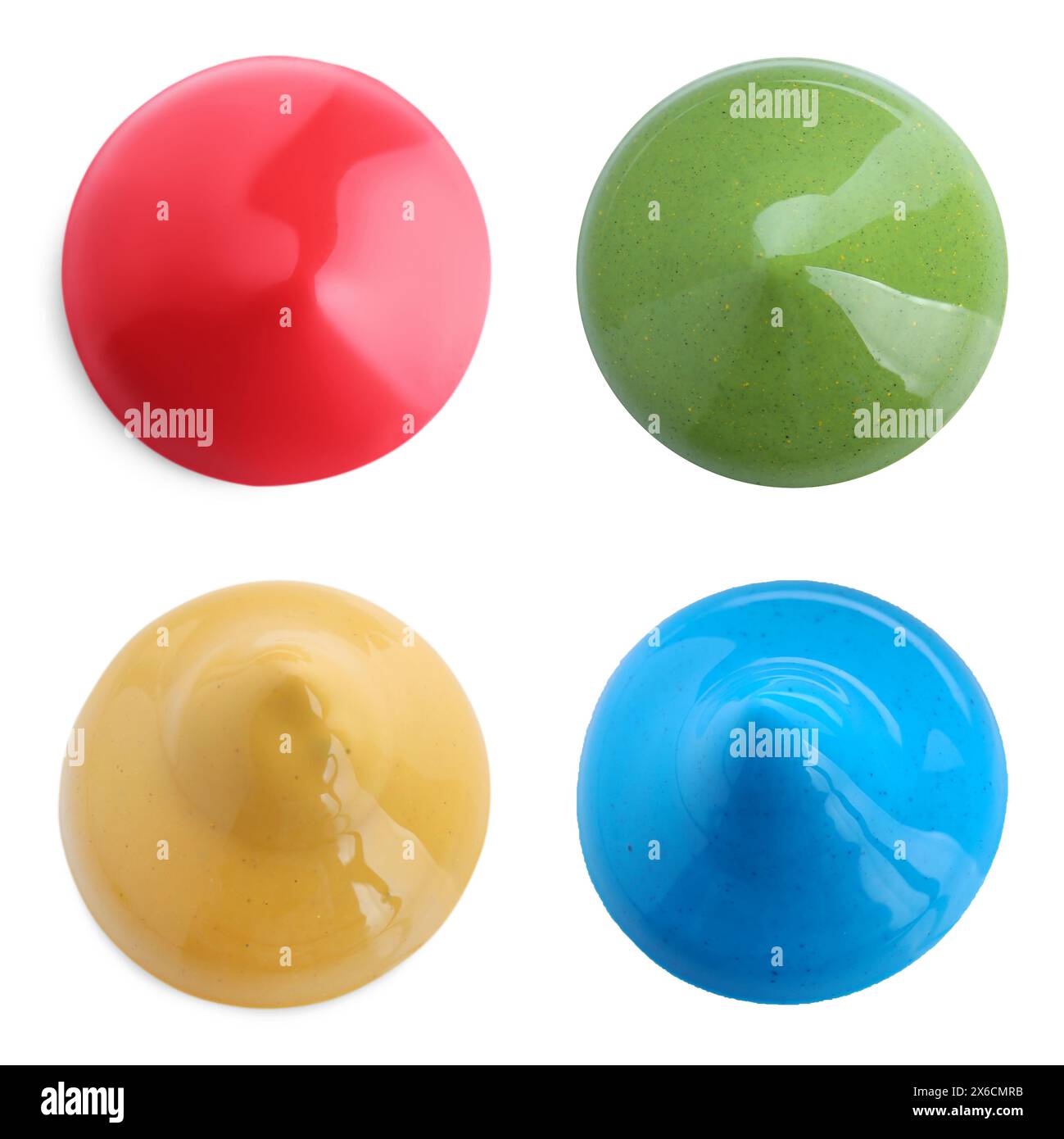Set with paint blobs of different colors isolated on white, top view ...
