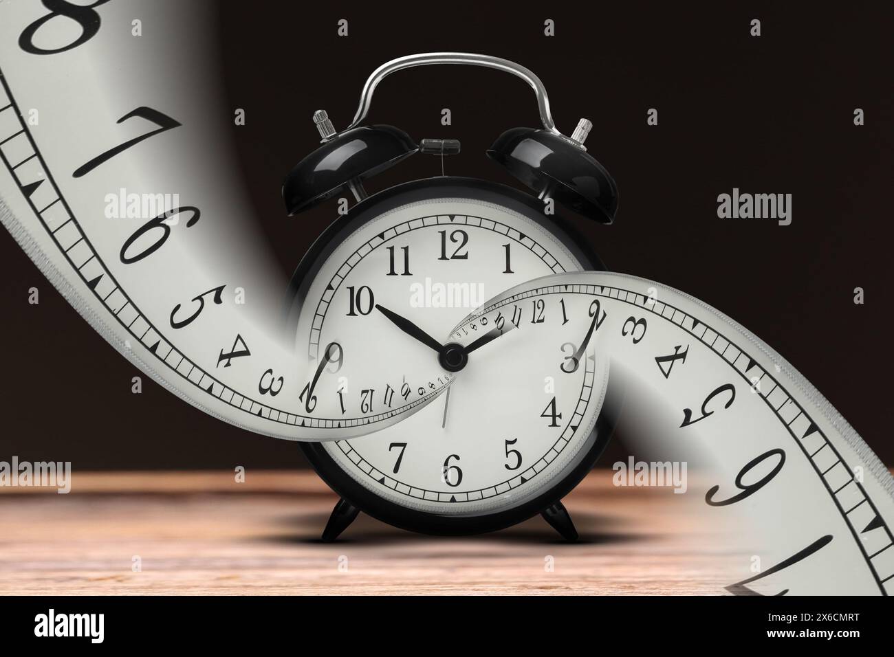 Infinity and other time related concepts. Alarm clock face twisted in ...