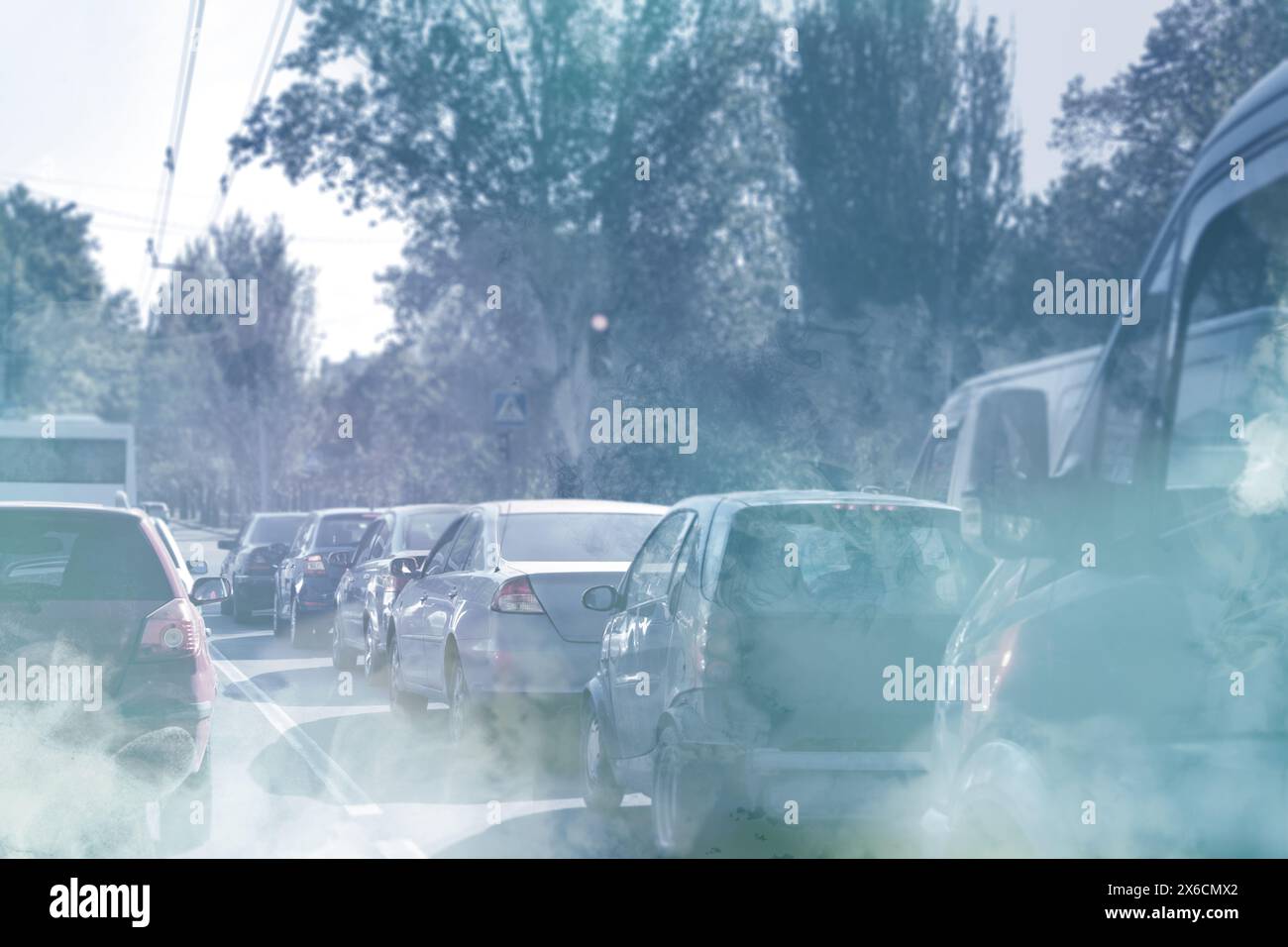 Environmental pollution. Air contaminated with fumes in city. Cars ...
