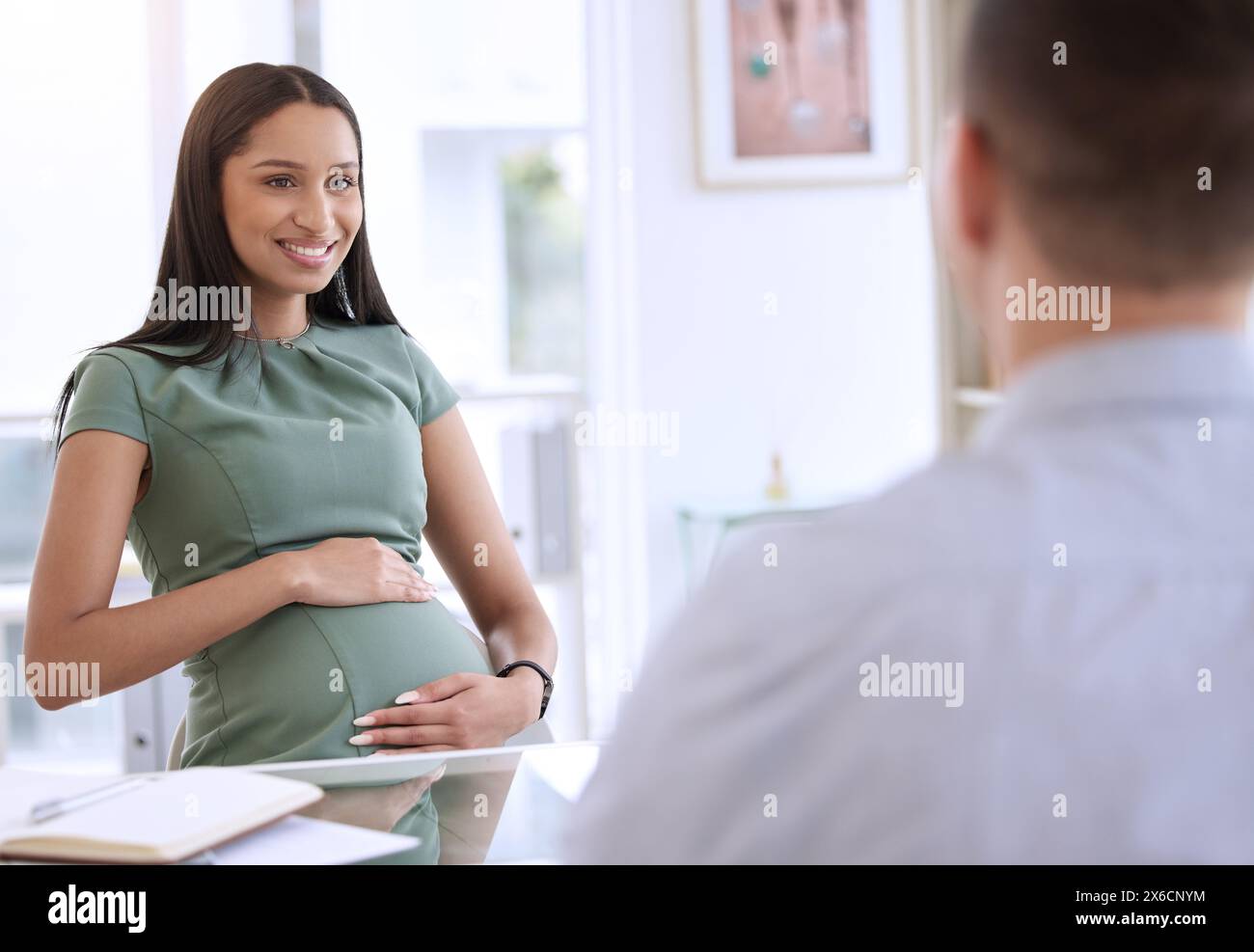 Pregnant woman, discussion and smile in office at startup with human ...