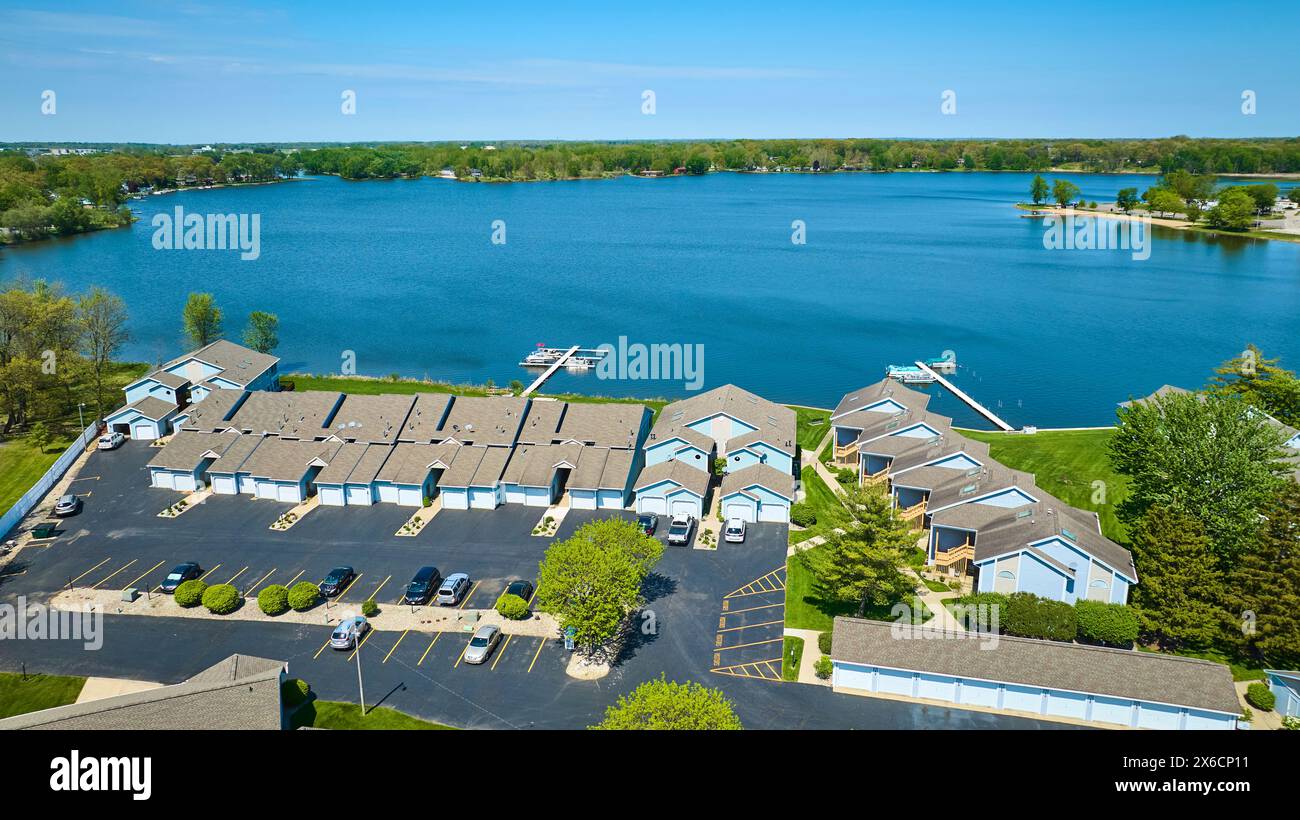 Aerial View of Serene Lakeside Townhouses and Dock in Warsaw, Indiana ...