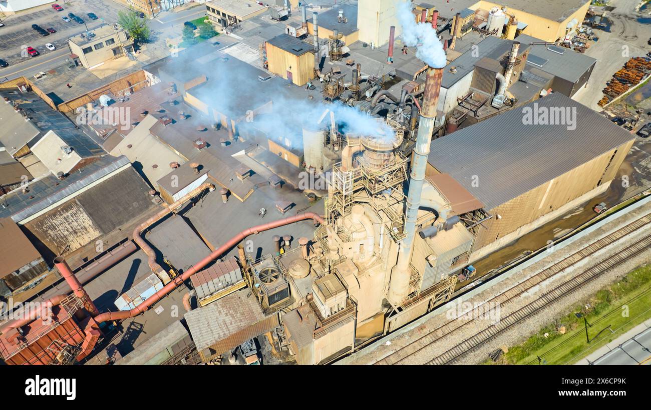 Aerial View of Busy Industrial Complex with Smoke in Urban Area Stock ...