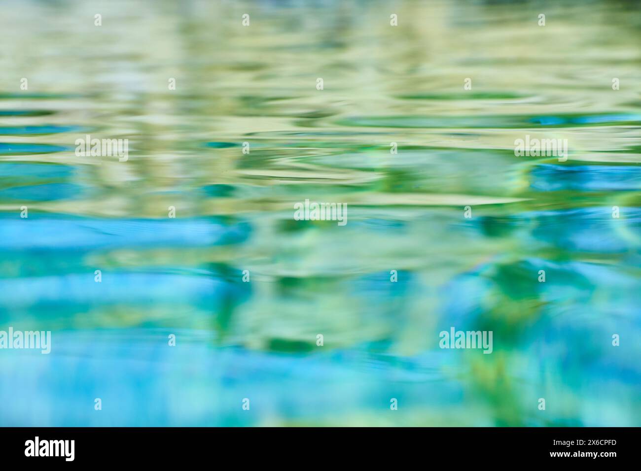 Serene Water Reflections in Green and Blue, Eye-Level Perspective Stock ...